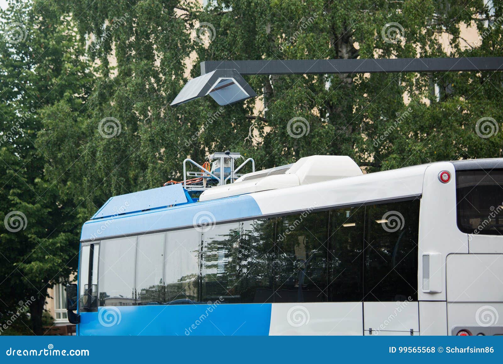 Electric bus at a stop stock photo. Image of transport - 99565568