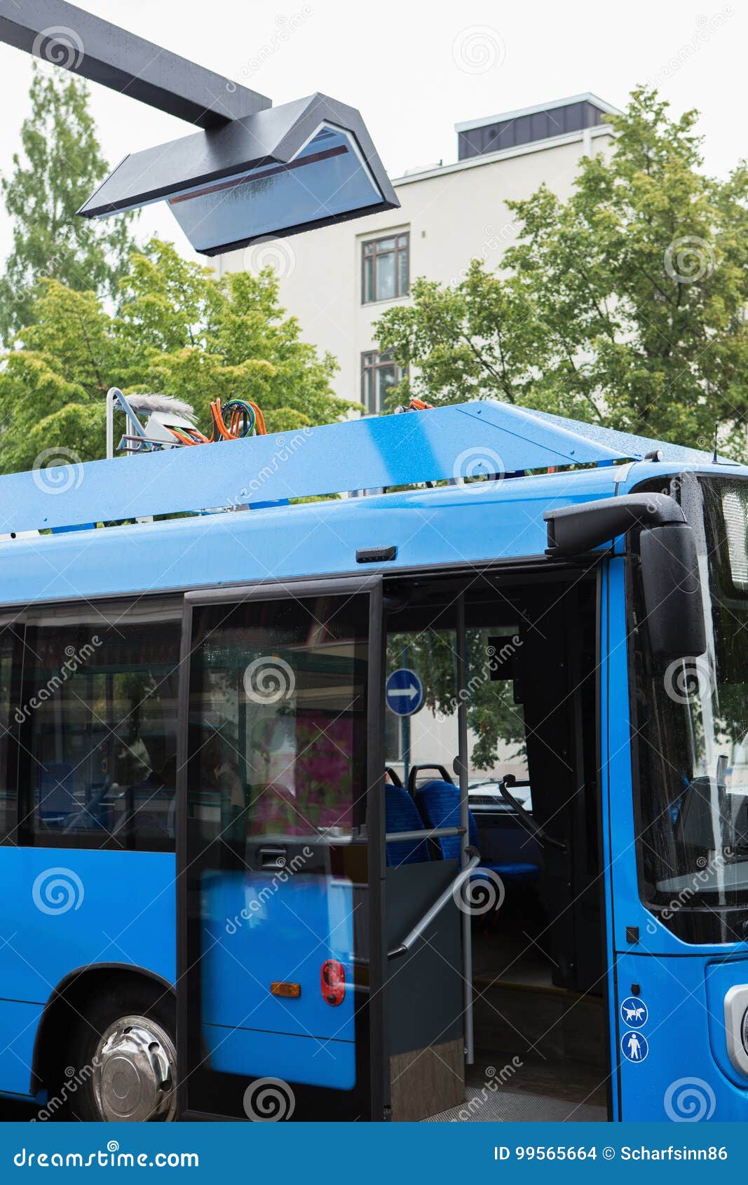 Electric bus at a stop stock photo. Image of connection - 99565664
