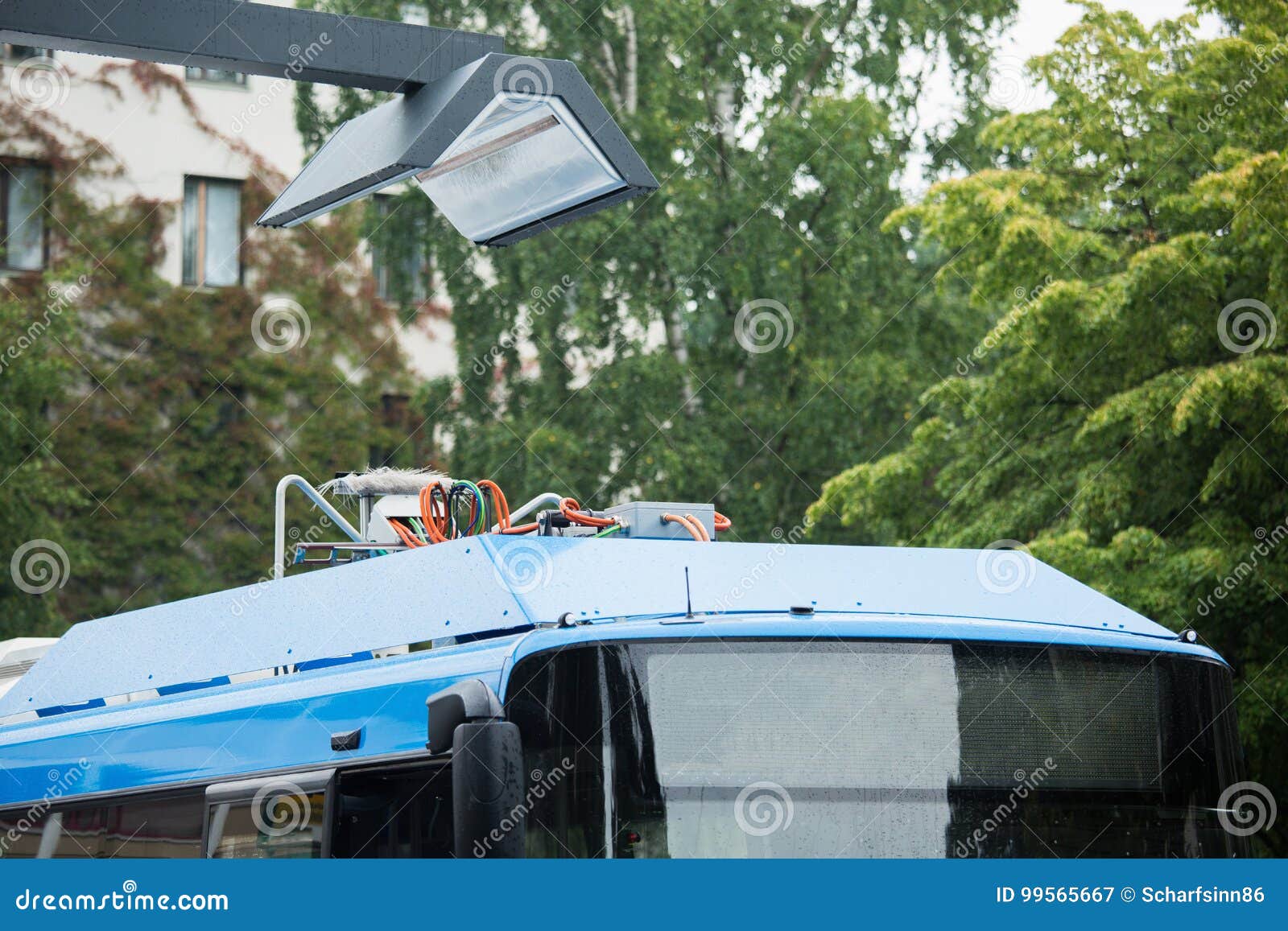 Electric bus at a stop stock image. Image of street, ecological - 99565667