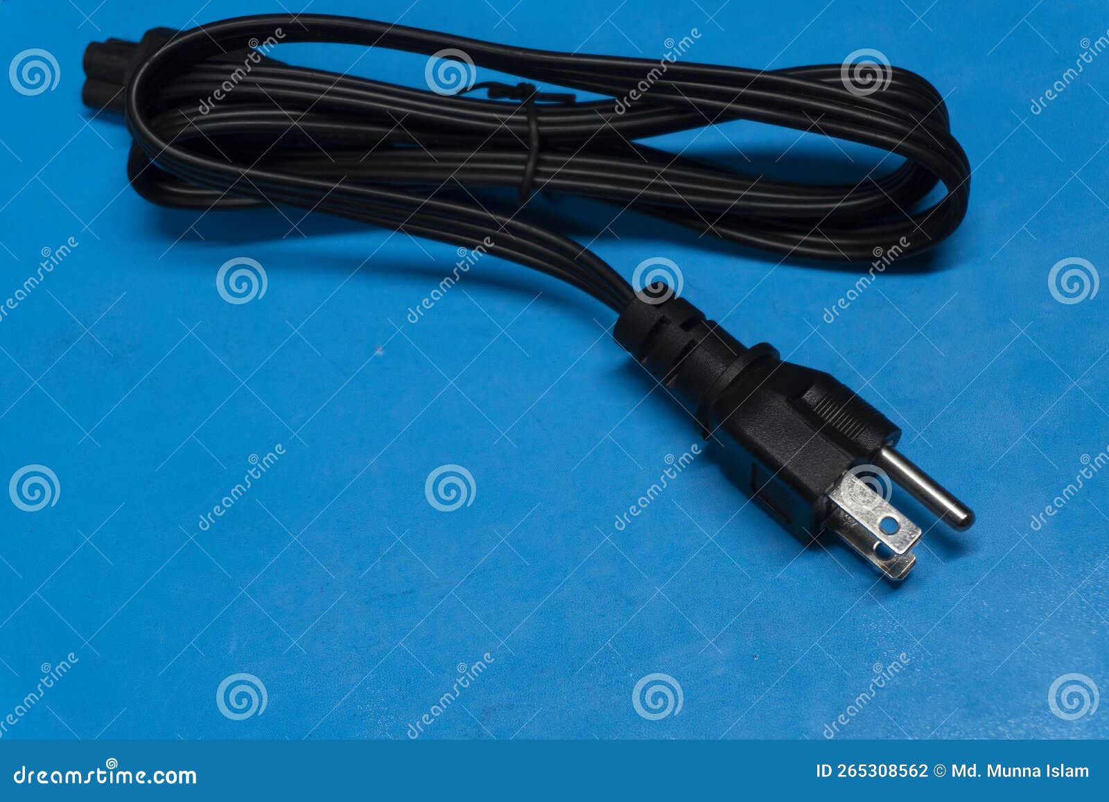 Electric Cable Plug. Three Pin Plug on the Table. Stock Photo - Image ...
