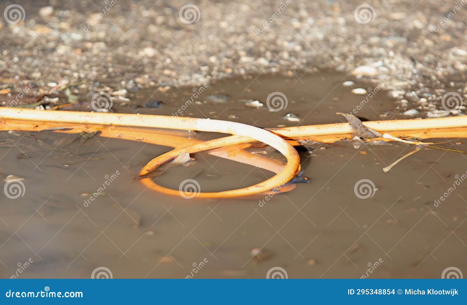 Electric Cable through the Water Stock Photo - Image of cable, dirt ...