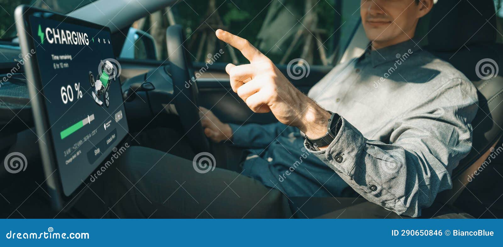 Electric Car Driver Checks Battery Charging Status App Screen in Car ...