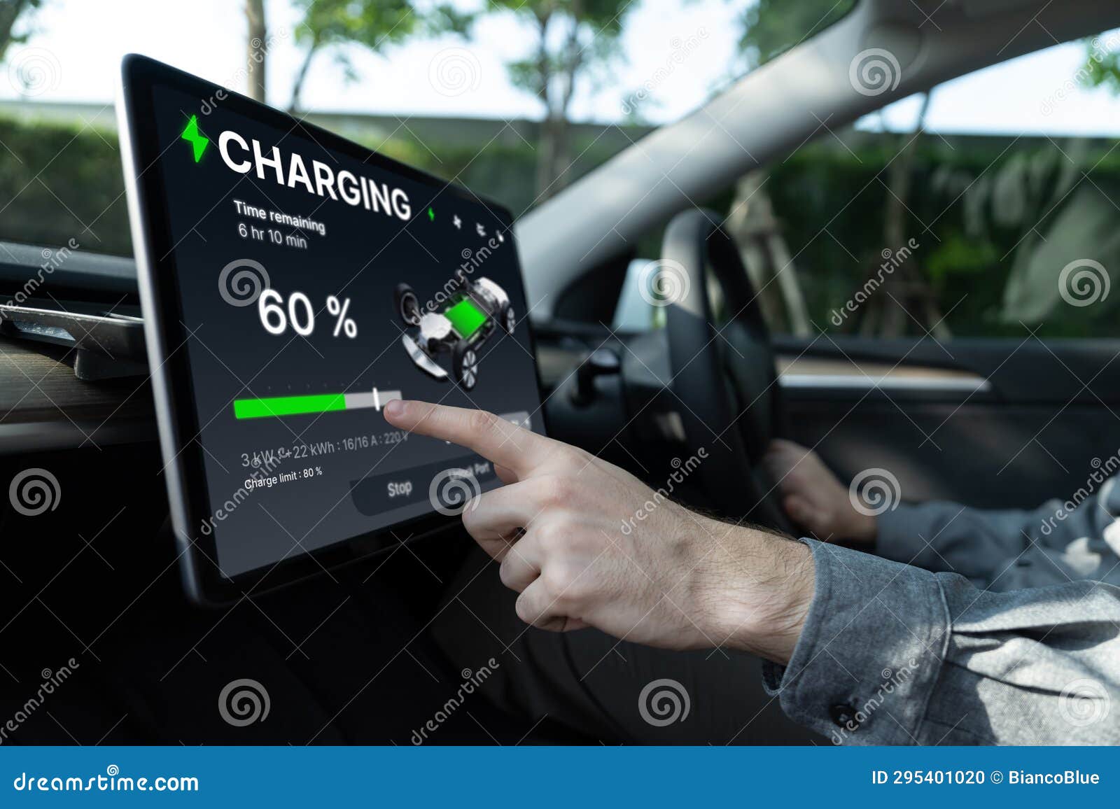 Electric Car Driver Checks Battery Charging Status App Screen in Car ...