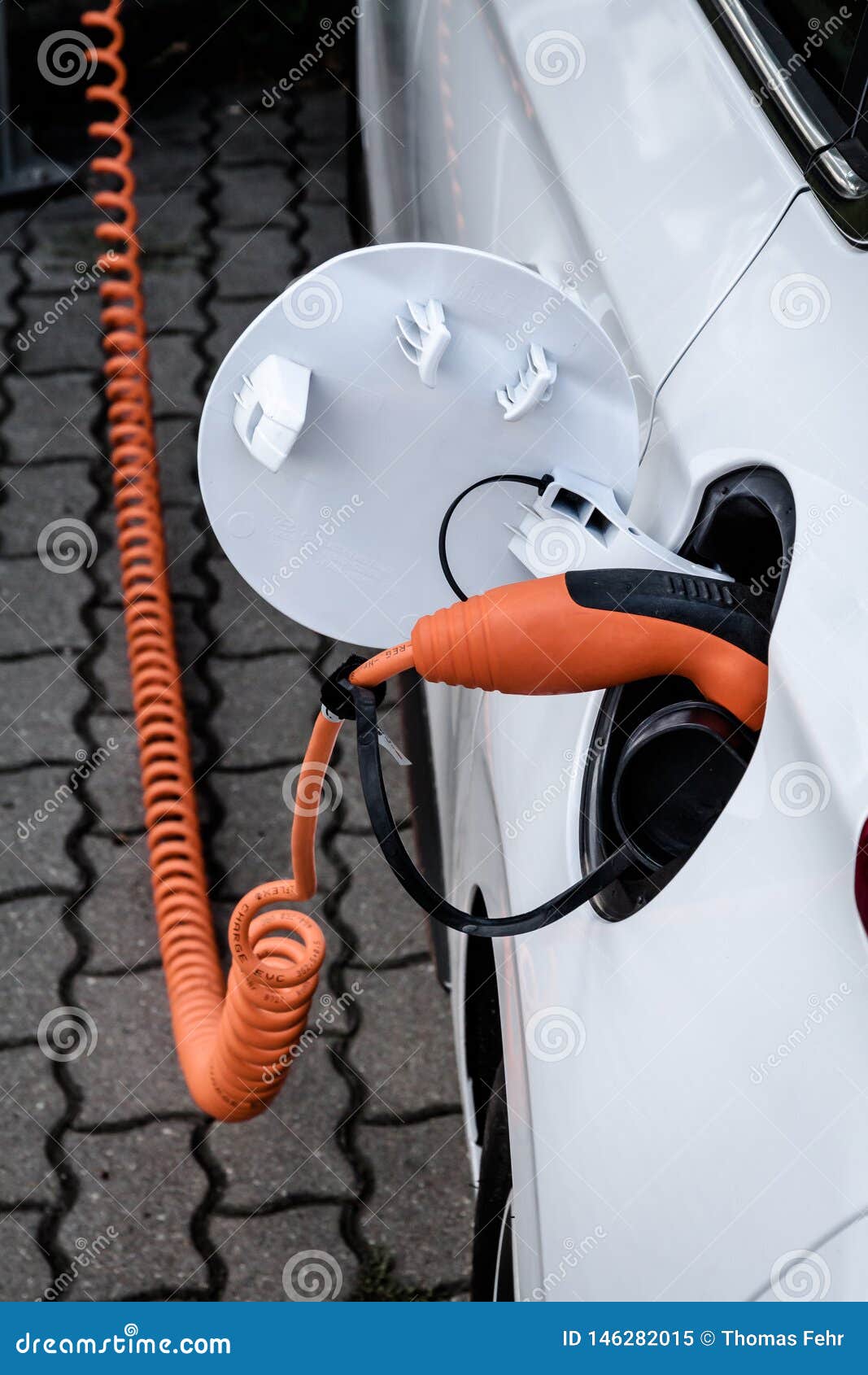 Electric car plug in editorial image. Image of connection - 146282015