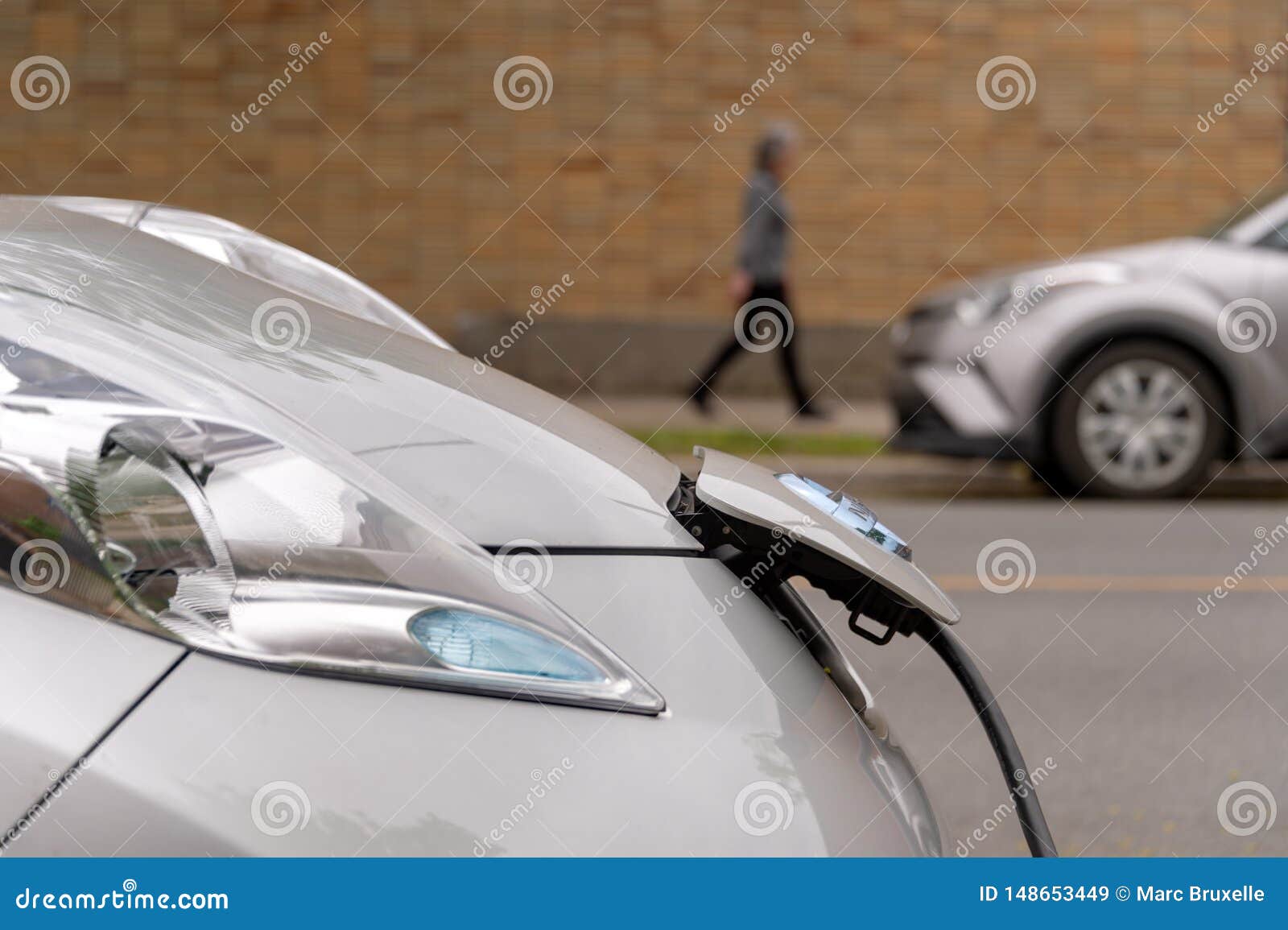 Electric Car Plugged into an EV Charging Station Editorial Stock Image ...