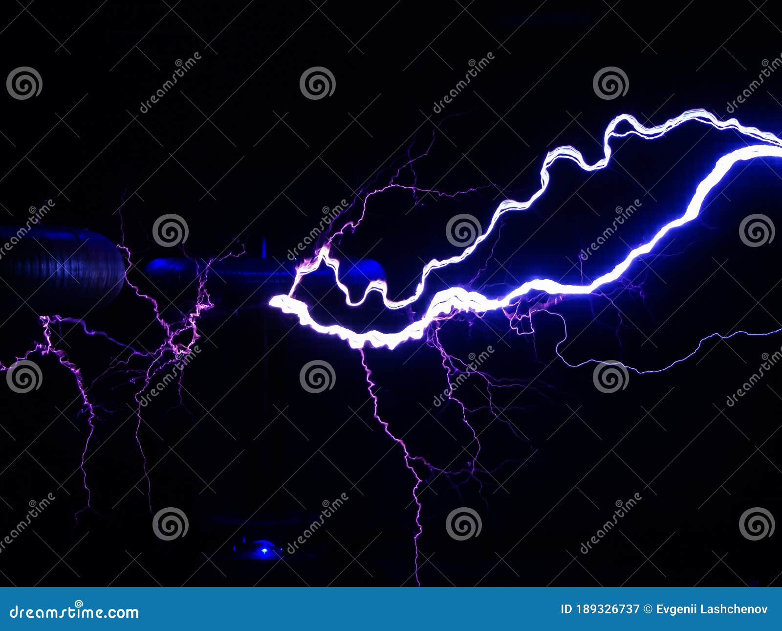 Electric Coils Emit Powerful and Bright Lightning in the Dark Stock ...