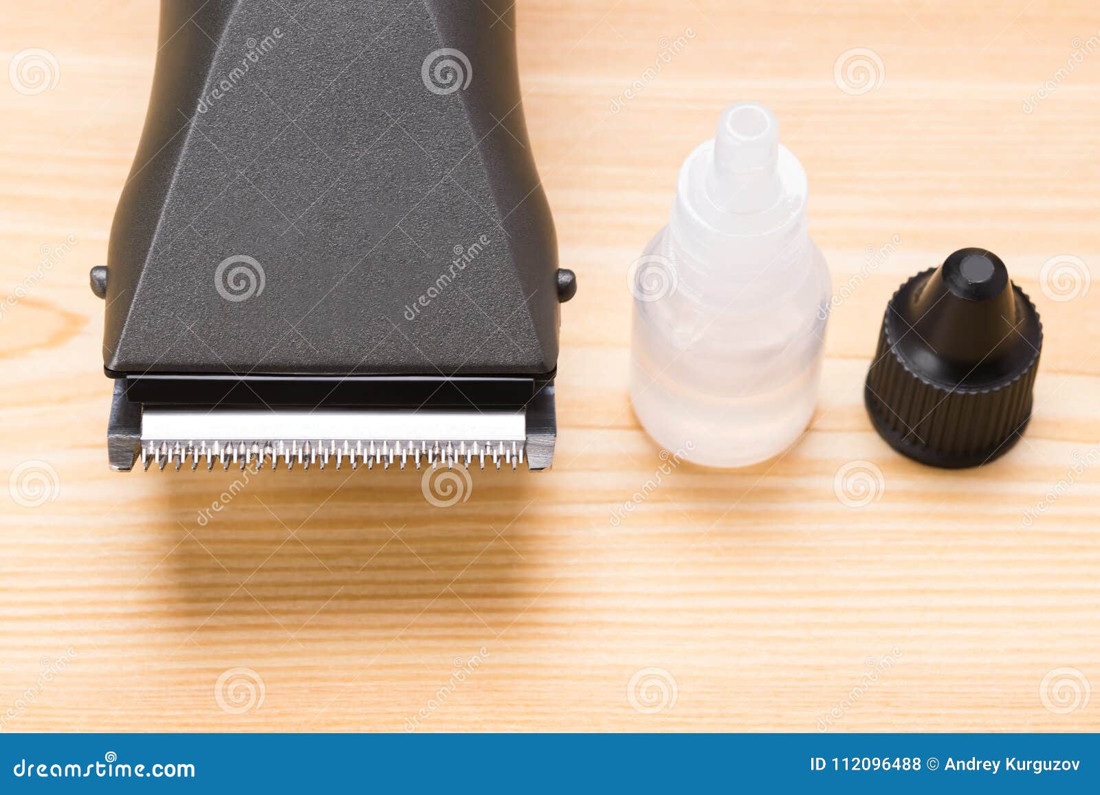 Electric Device for Cutting Hair on a Wooden Table Stock Photo - Image ...