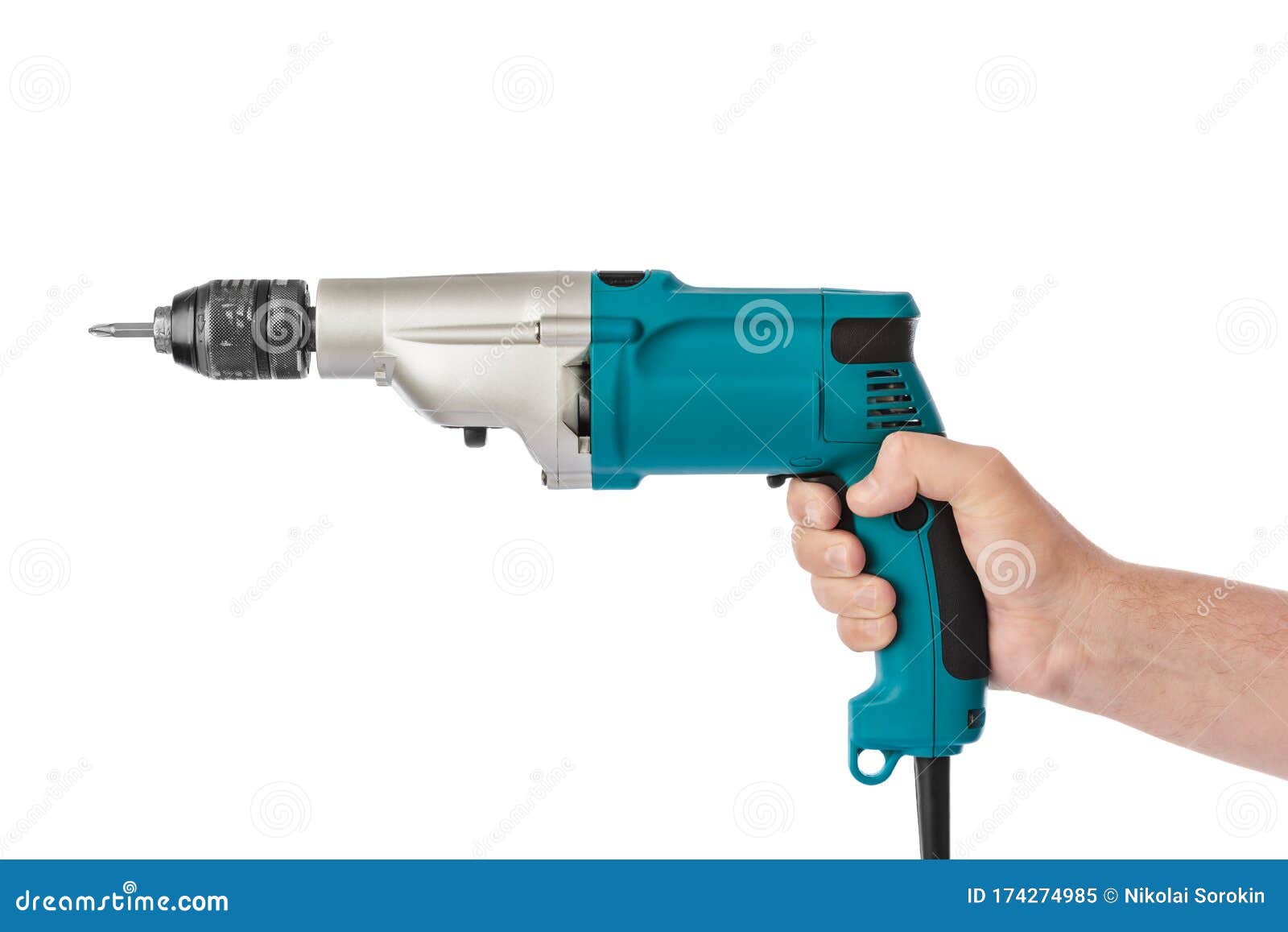 Electric drill in hand stock image. Image of hands, drilling - 174274985