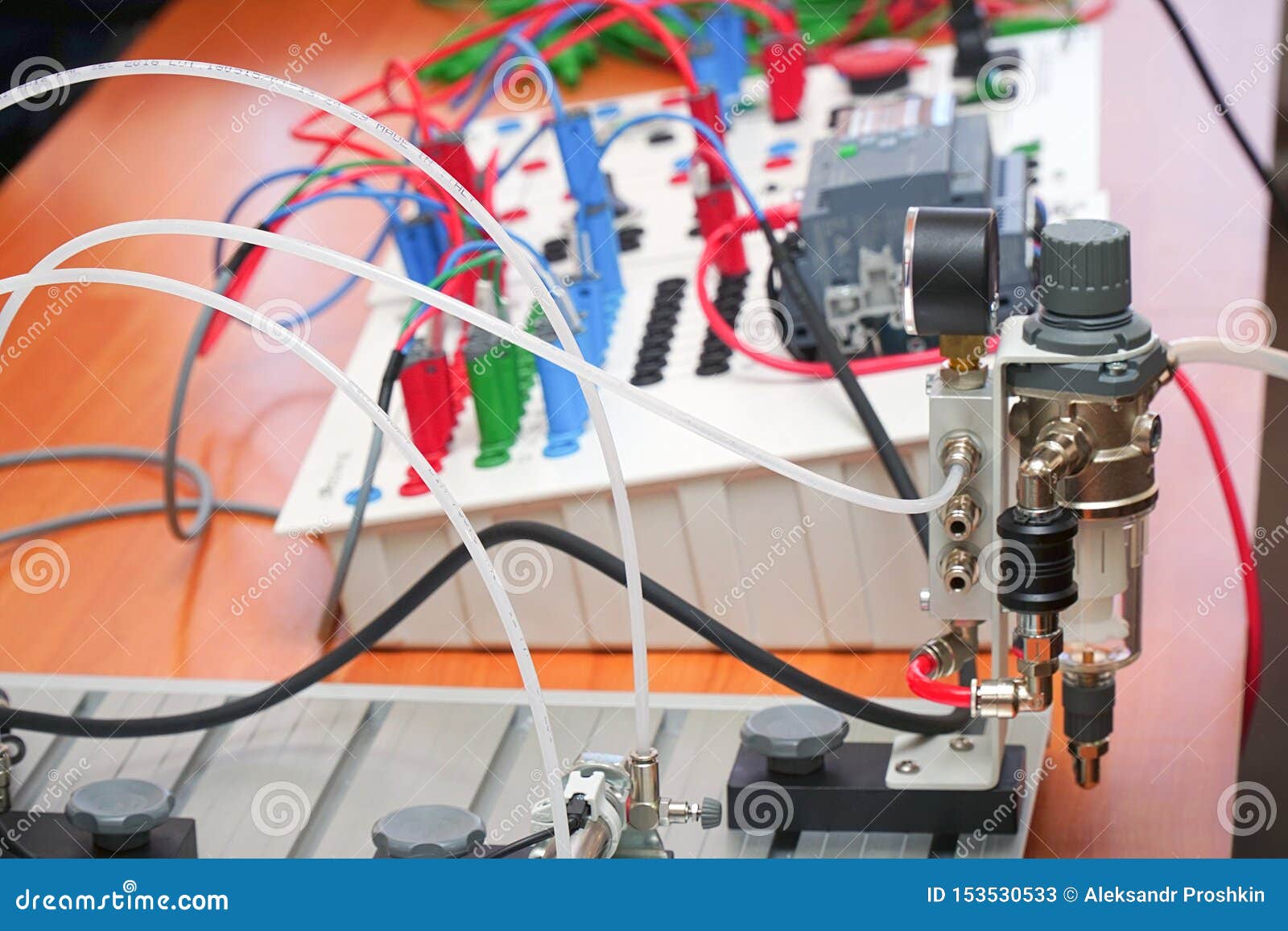 Electric Educational Device White Color with the Wires on Table Stock ...