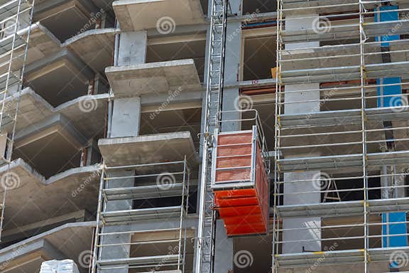 Electric Elevator for Construction Site Installed Outside the Facade of ...