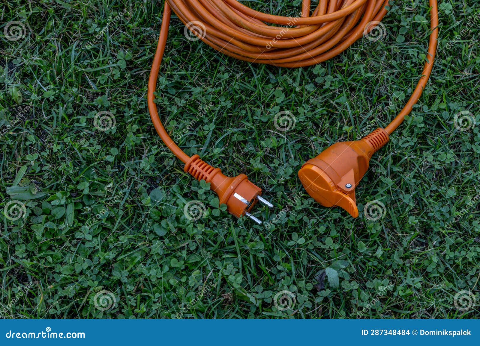 Electric Extension Cord and Power Connection in the Garden Stock Photo ...