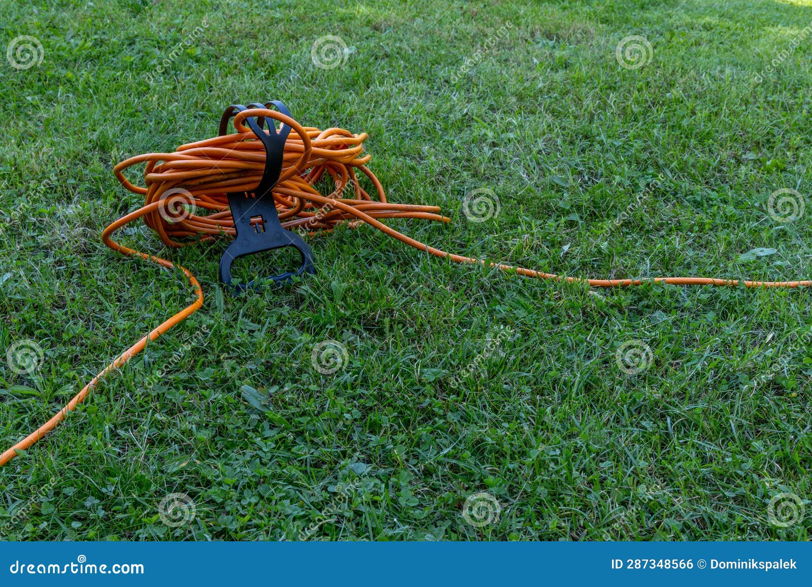 Electric Extension Cord and Power Connection in the Garden Stock Photo ...