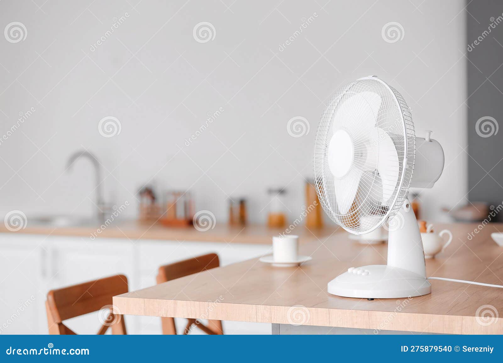 Electric Fan on Table in Kitchen Stock Photo - Image of cool ...