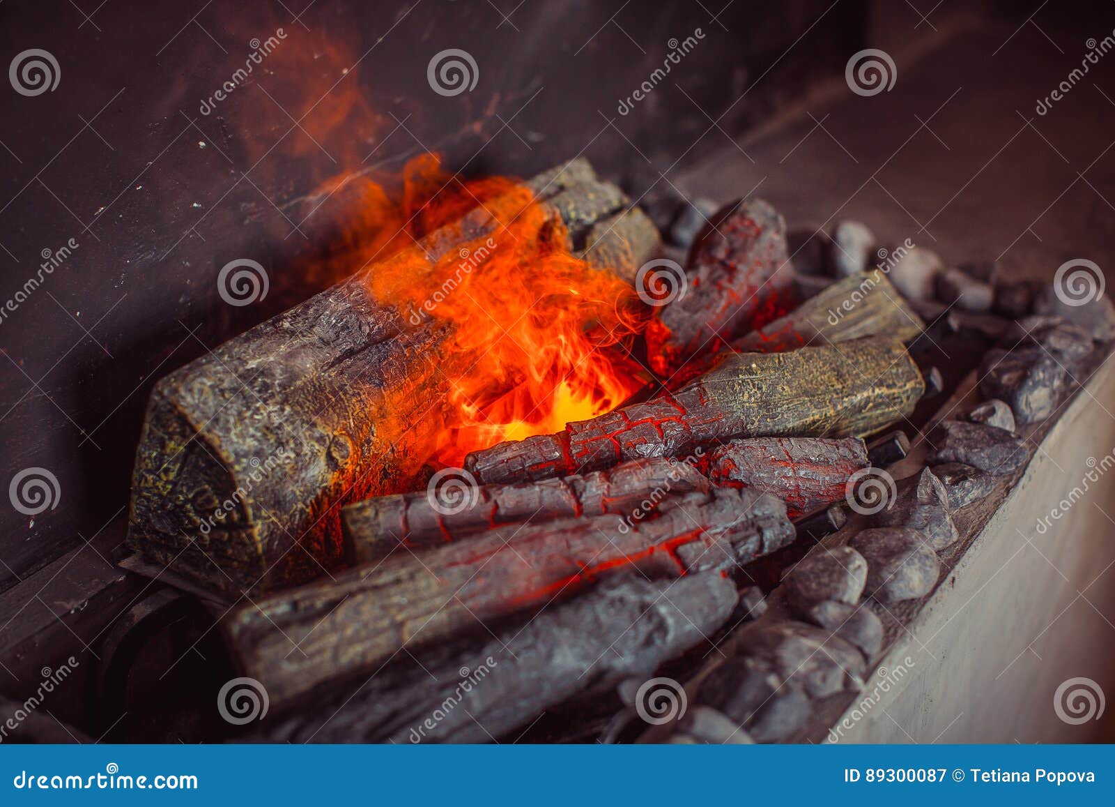 Electric Fireplace with Artificial Sparkling Flame Stock Image - Image ...