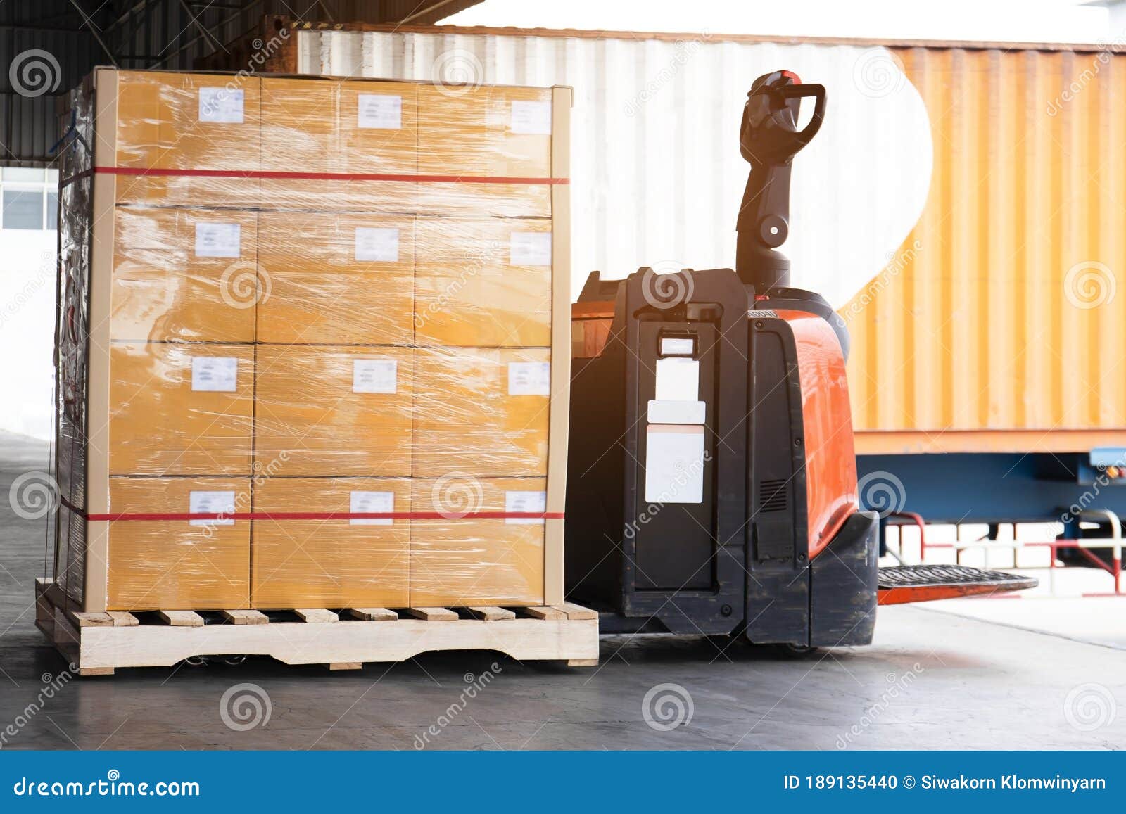 Electric Forklift Pallet Jack with Large Shipment Goods Pallet. Stock ...