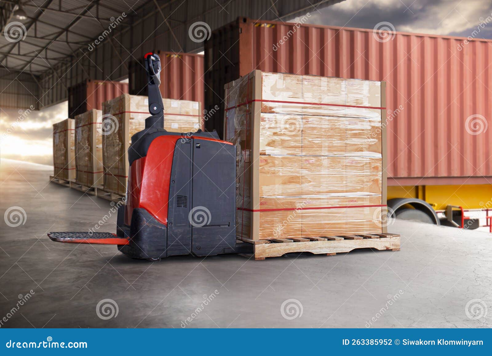 Electric Forklift Pallet Jack with Packaging Boxes Stacked on Pallet ...