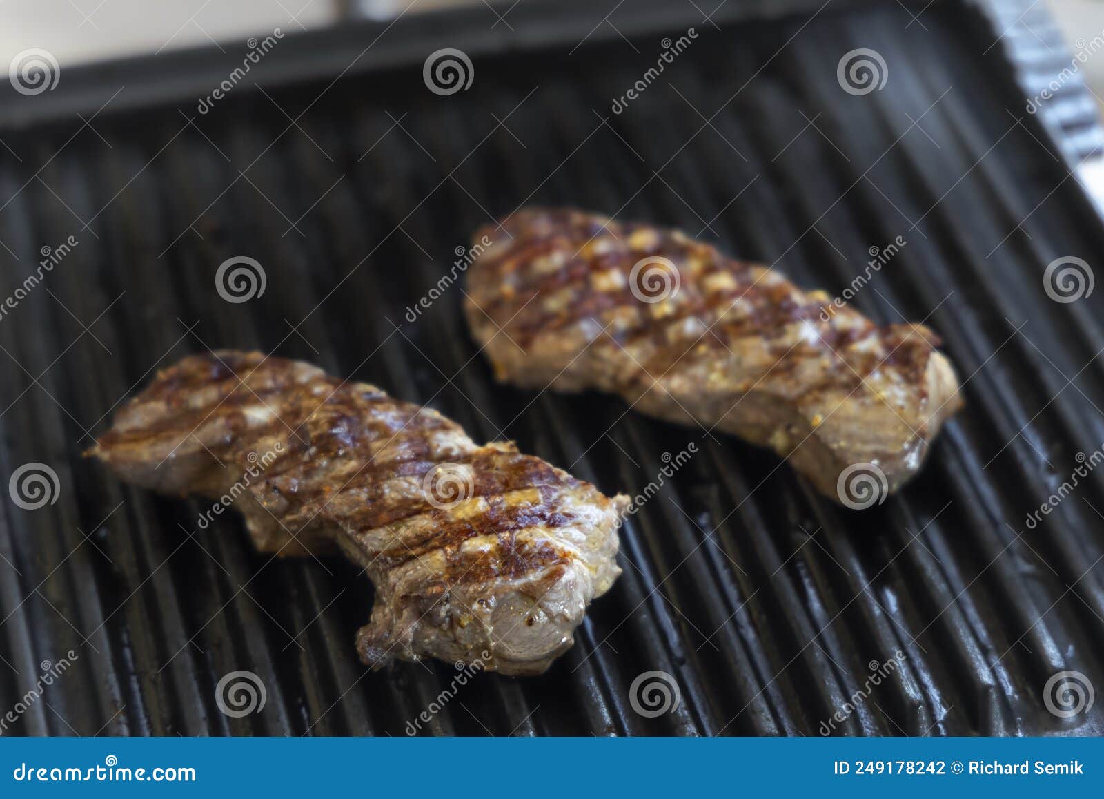 Electric Grill with Roast Beef Stock Photo - Image of cook, grilled ...