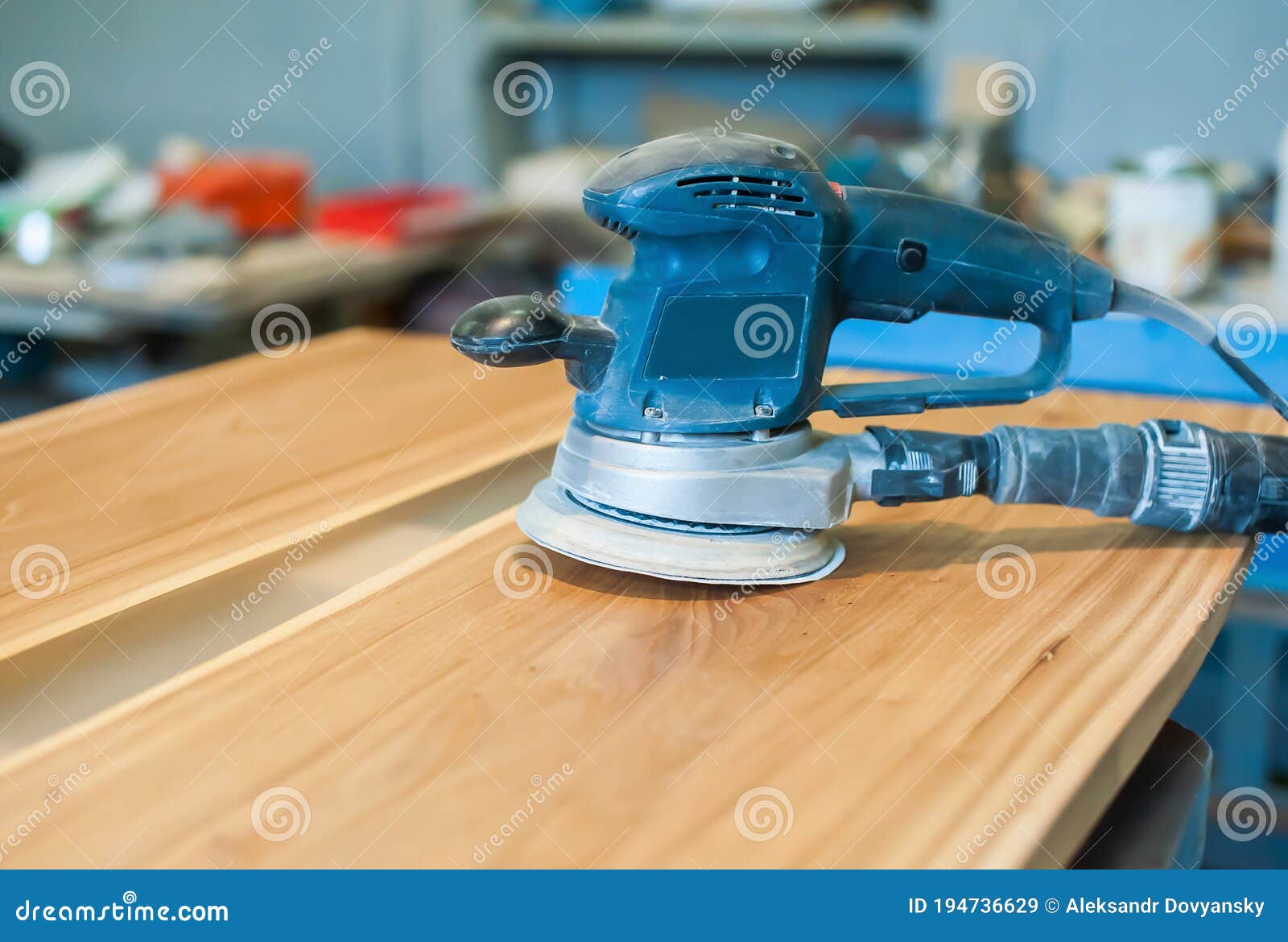 Electric Grinder on a Board in a Carpentry Workshop. Close-up Stock ...
