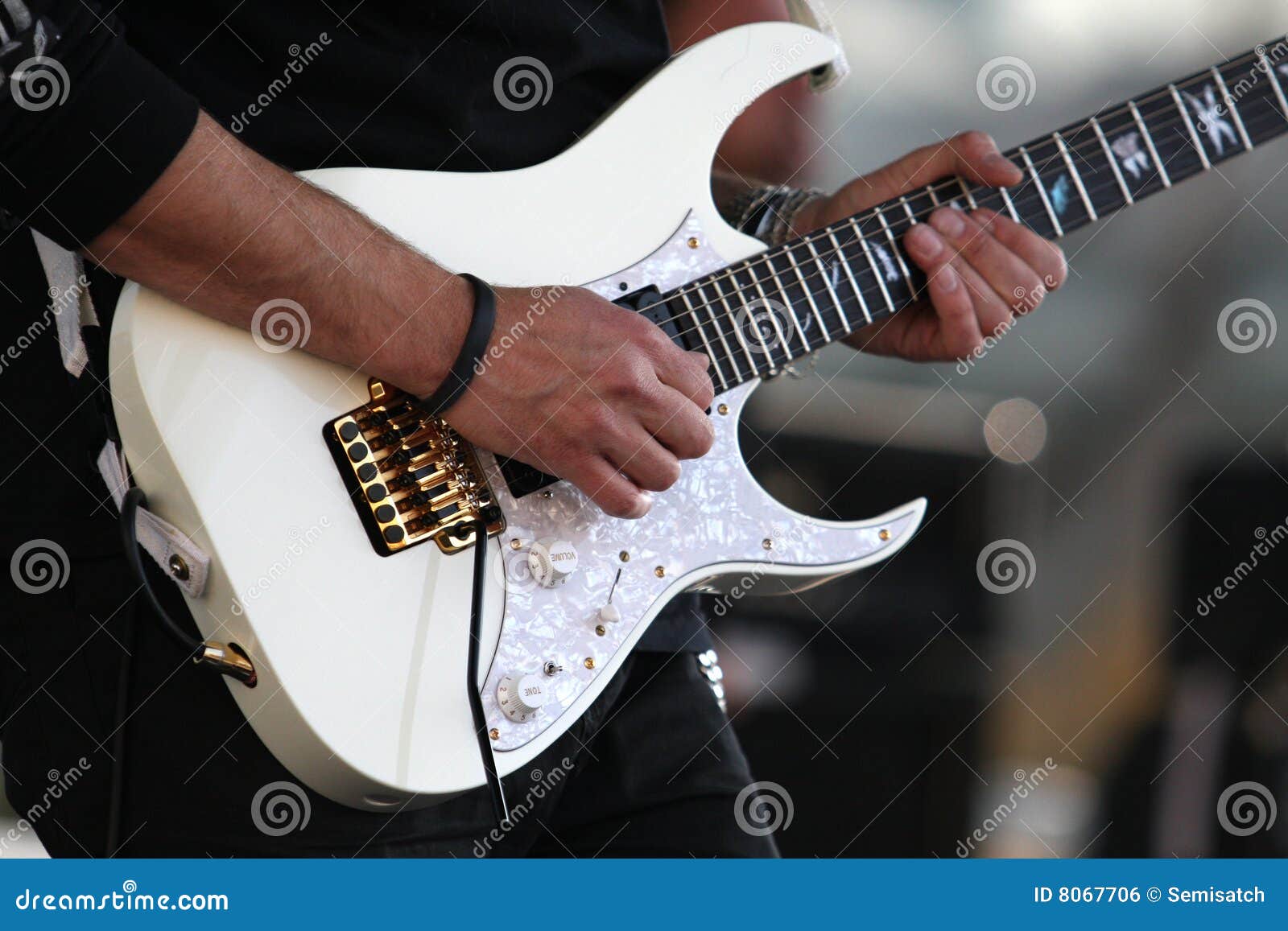 Electric guitar and player stock photo. Image of heavy - 8067706