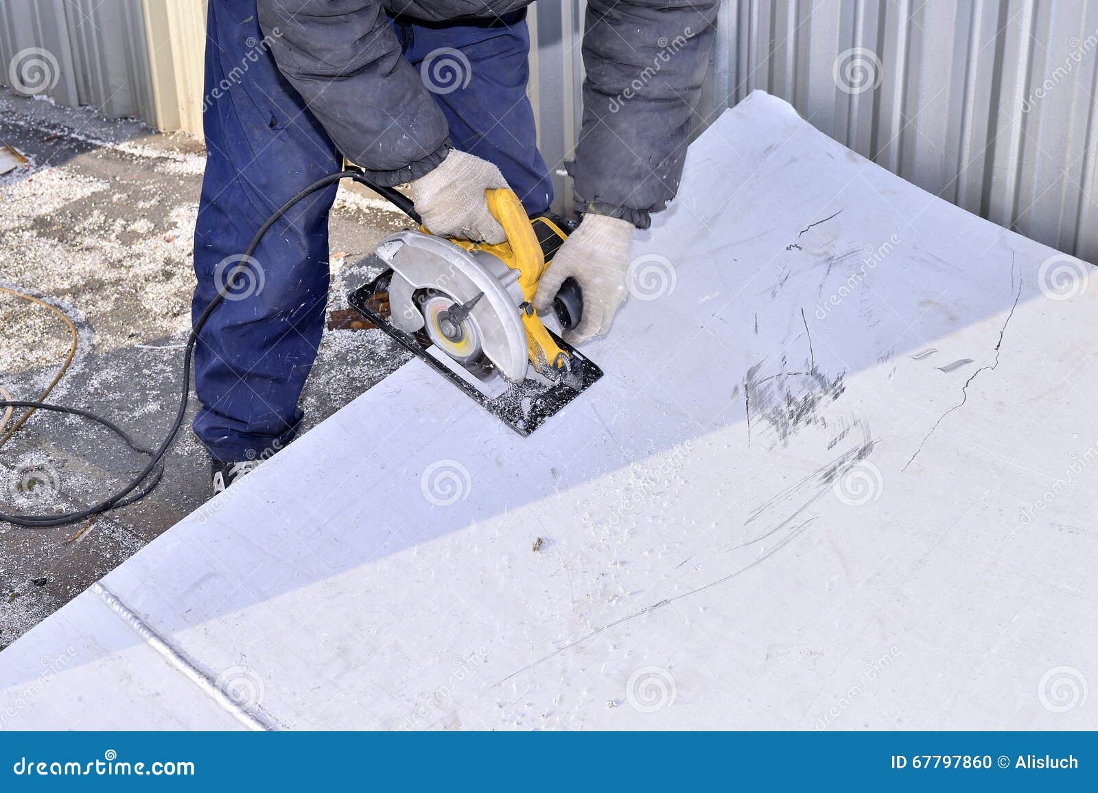 Electric Hand Tool in the Hands of the Worker, Cutting Sheet Met Stock ...