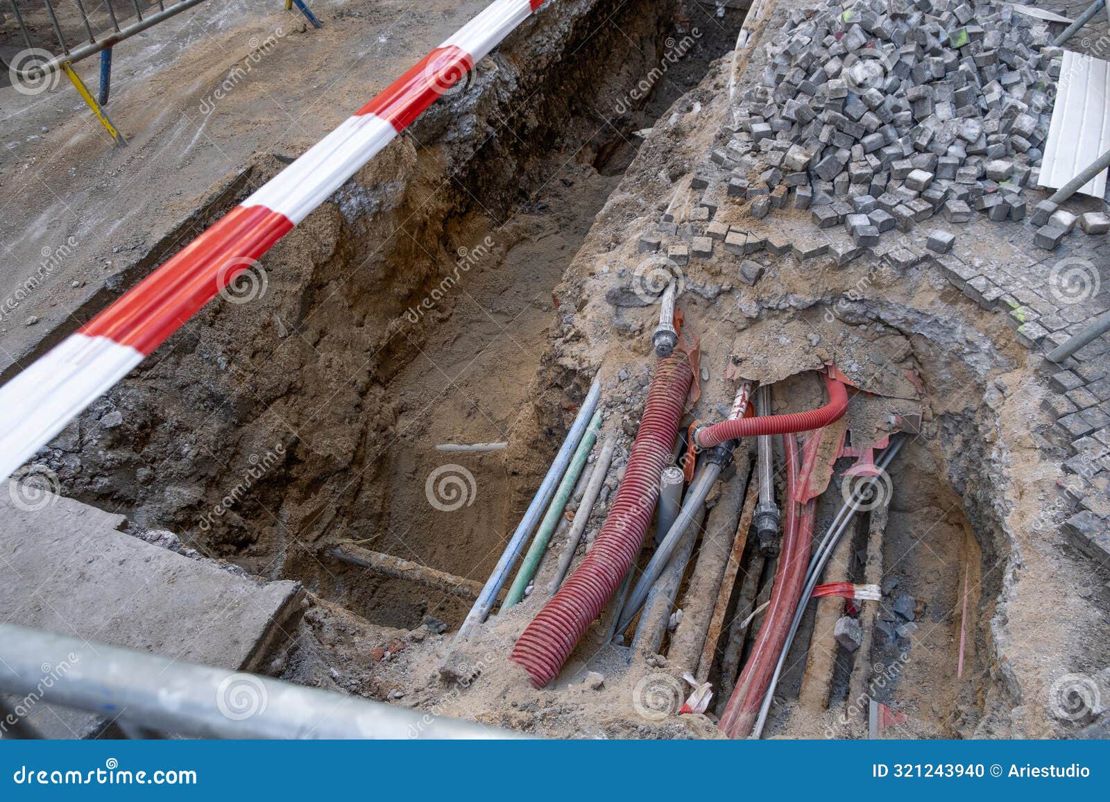 Electric and High-speed Internet Network Cables in Red Corrugated Pipe ...