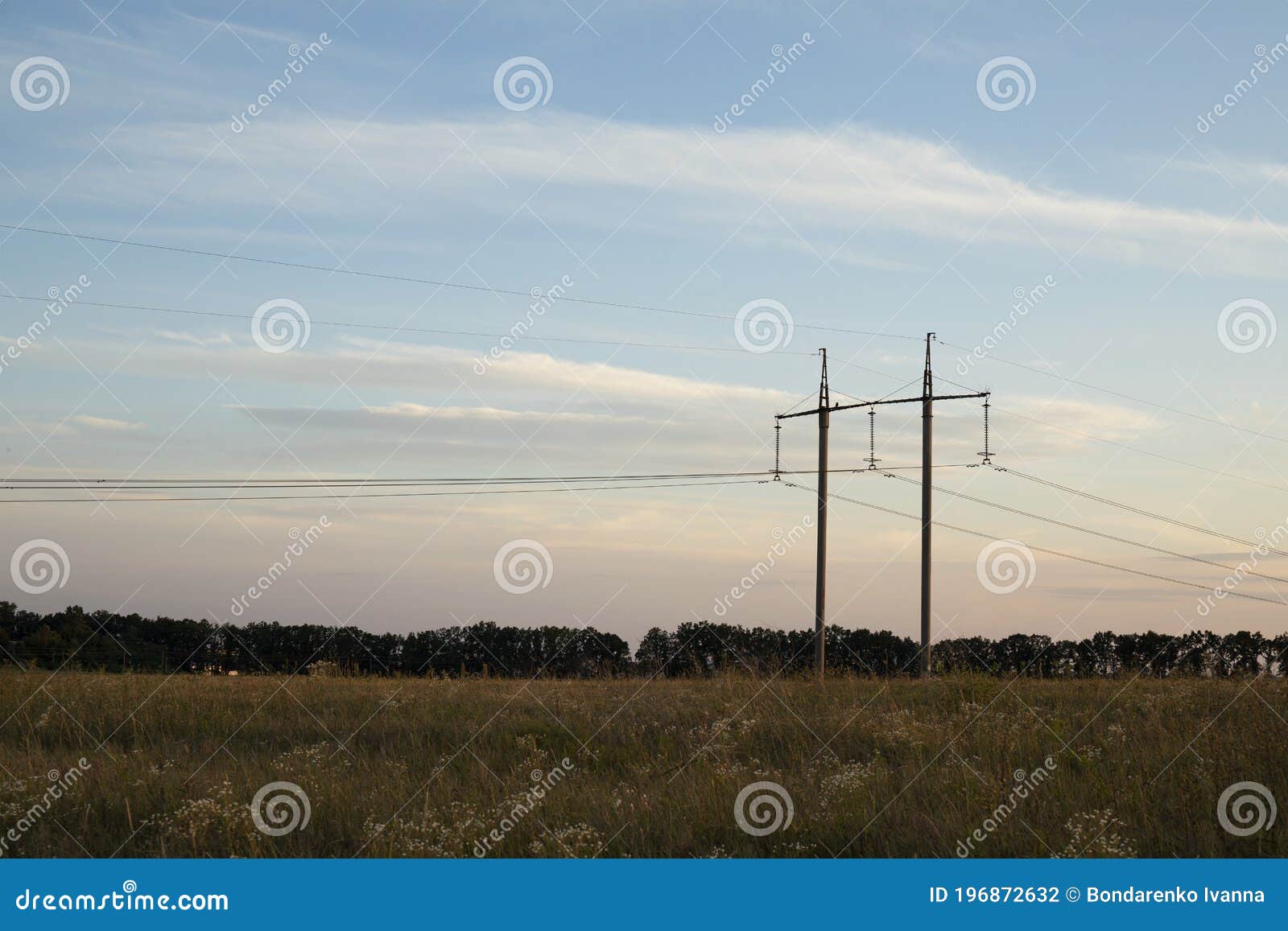 Electric High Voltage Power Post in the Field Stock Photo - Image of ...