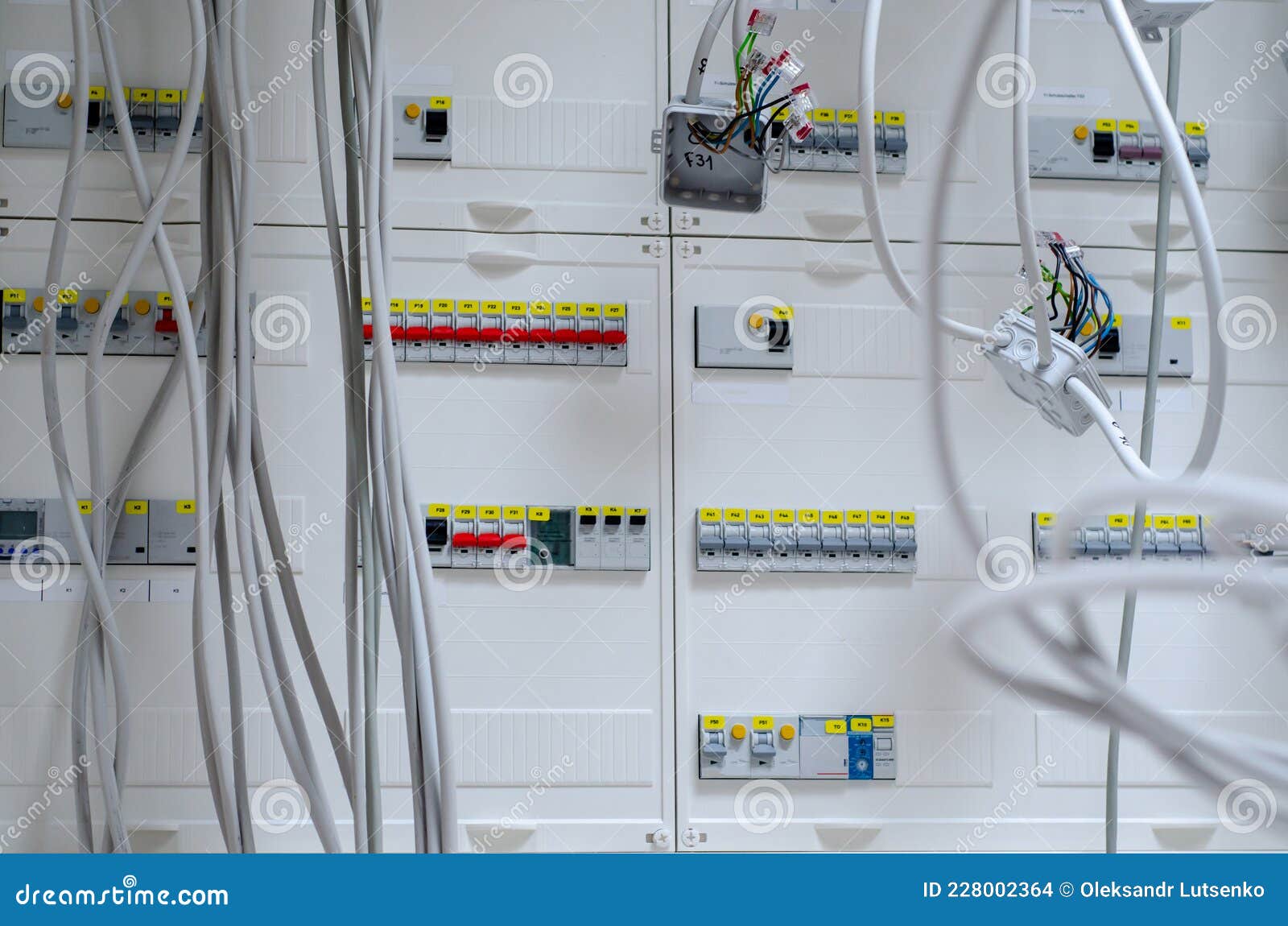 Electric Installation Work. Connecting Wires To the Switchboard Stock ...