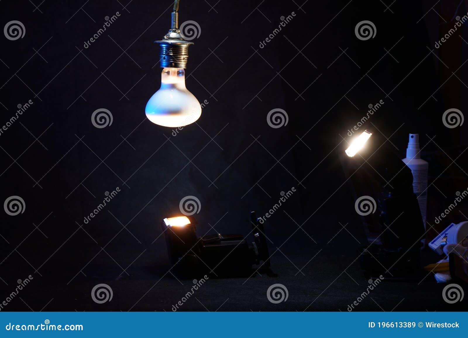 Electric Light Bulb and Flashlights in the Darkness Stock Image - Image ...