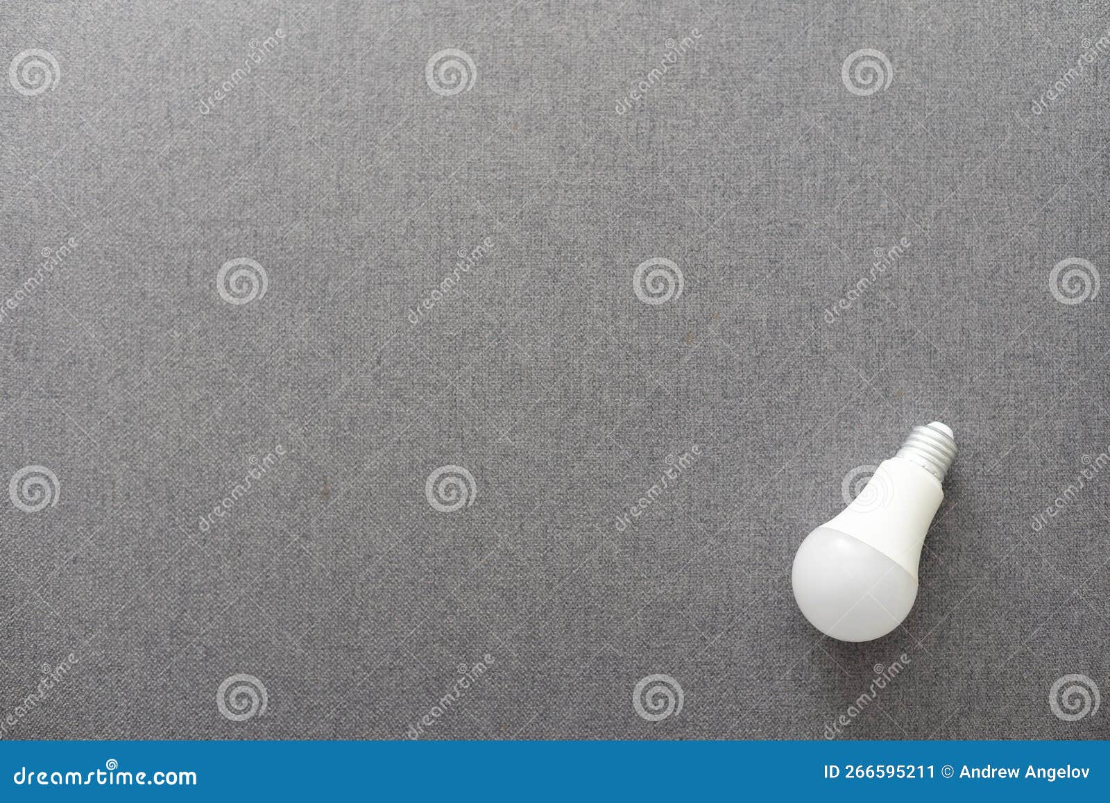 Electric Light Bulb on a Gray Background. Stock Image - Image of ...
