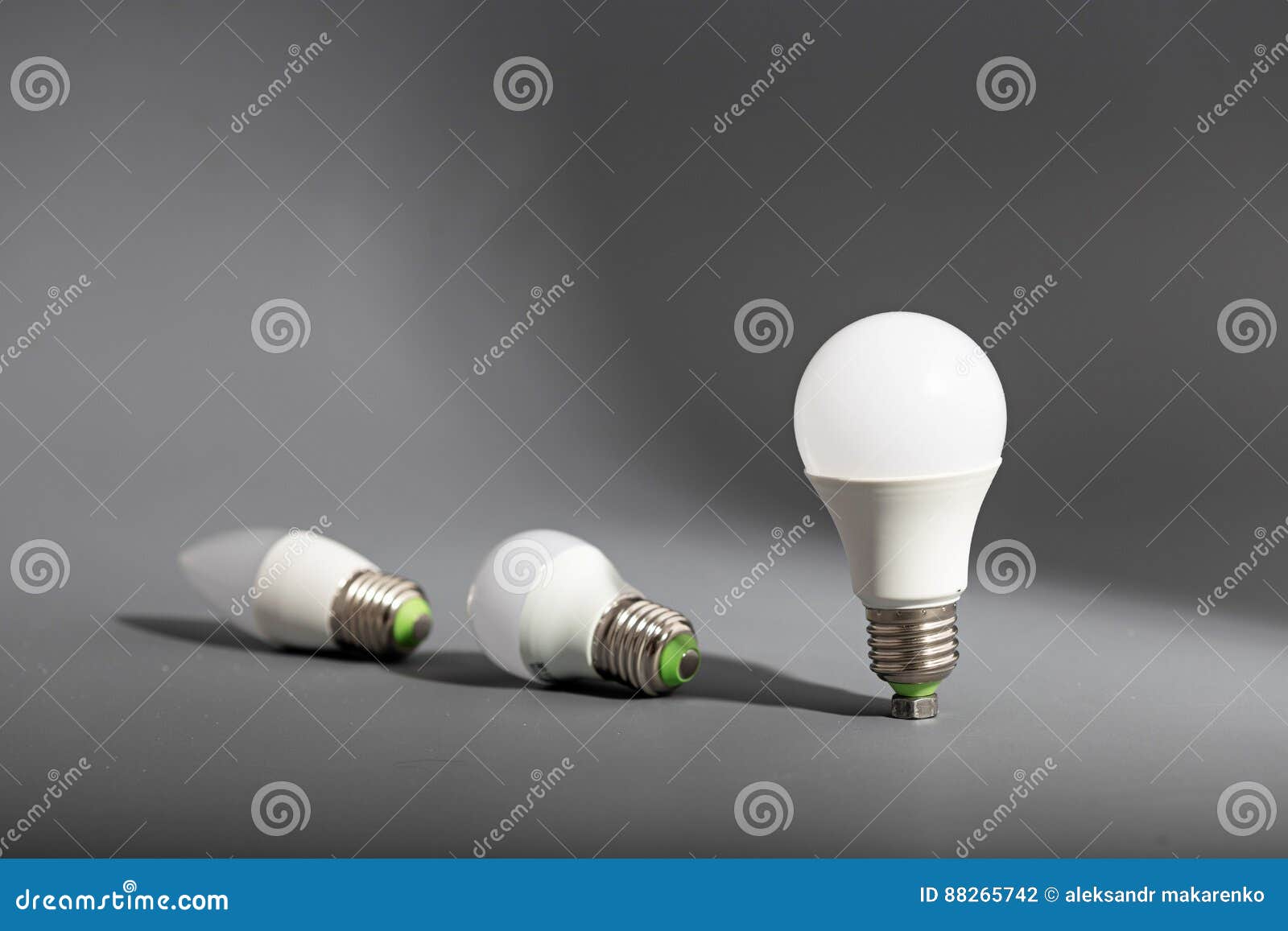 Electric Light Bulb on a Gray Background Stock Photo - Image of glass ...