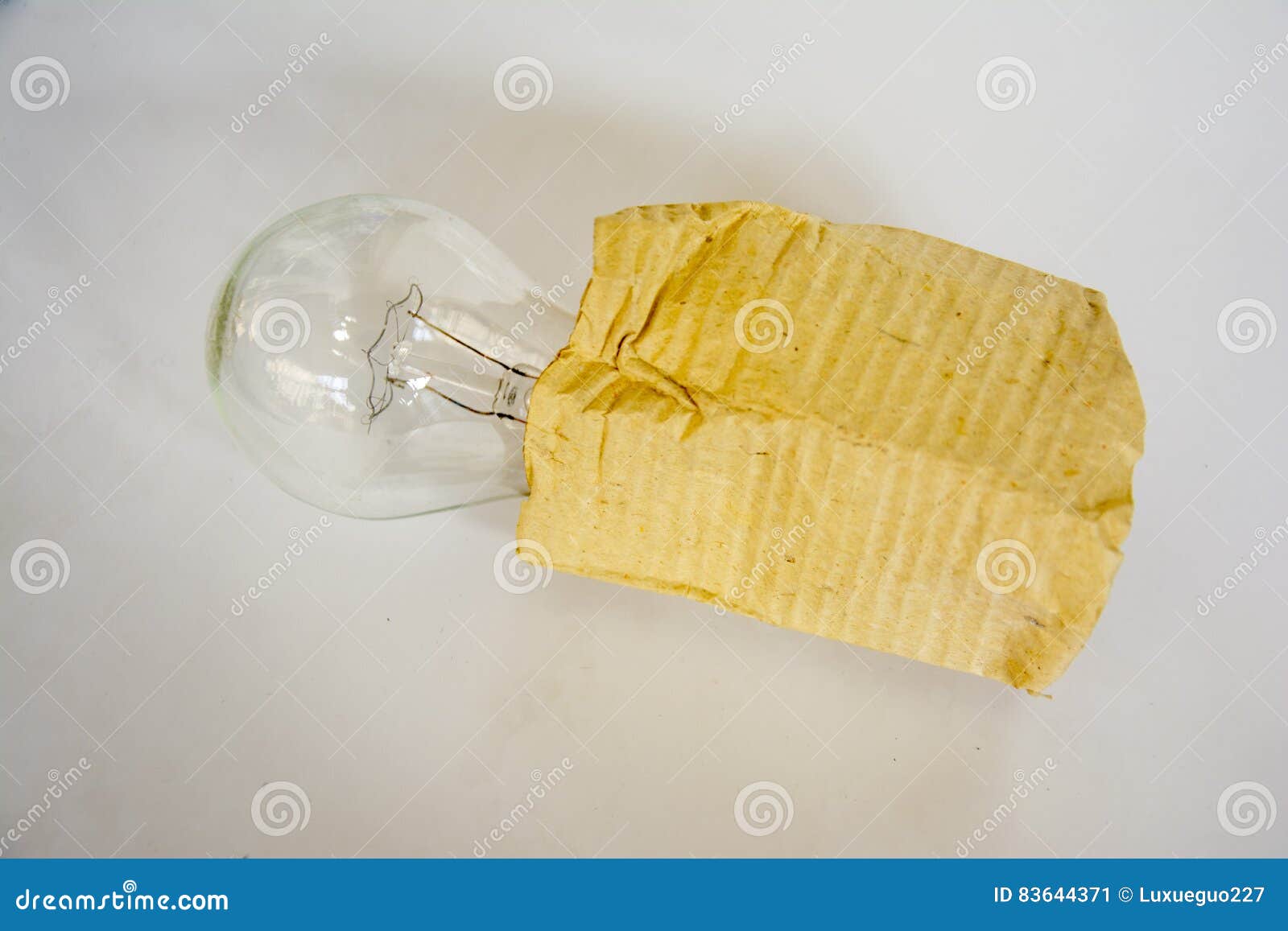 Electric Light Bulb in Packing Paper Stock Image - Image of objects ...