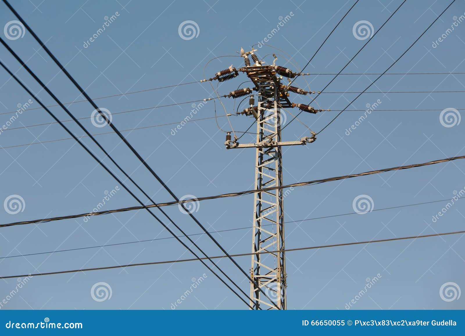 Electric line columns stock image. Image of current, mast - 66650055