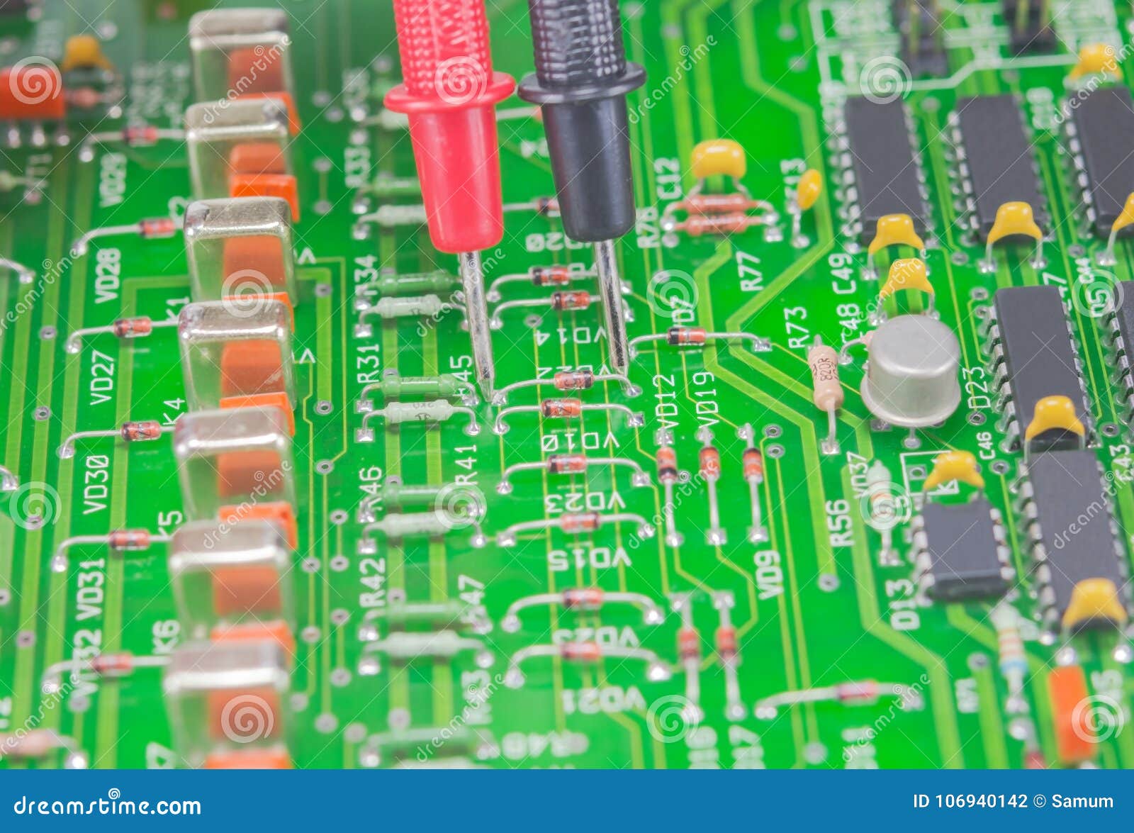 Multimeter Probes Examining a Computer Circuit Board Stock Photo ...