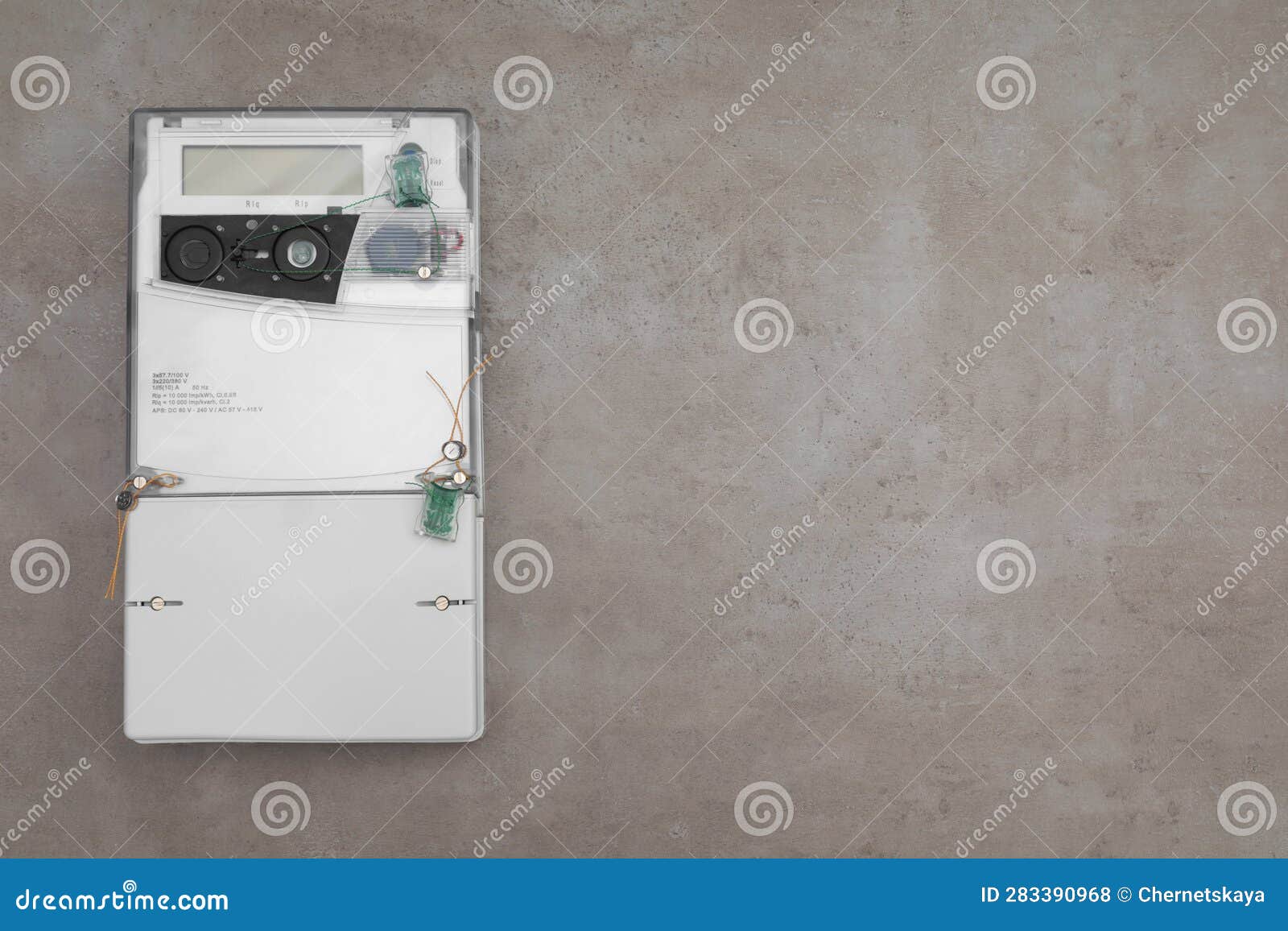 Electric Meter on Grey Background, Top View with Space for Text ...