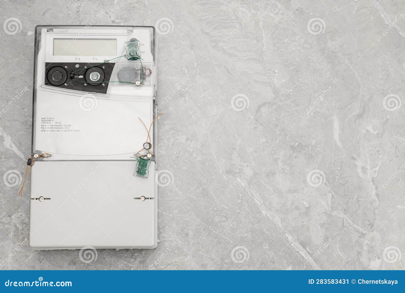 Electric Meter on Light Grey Marble Background, Top View with Space for ...