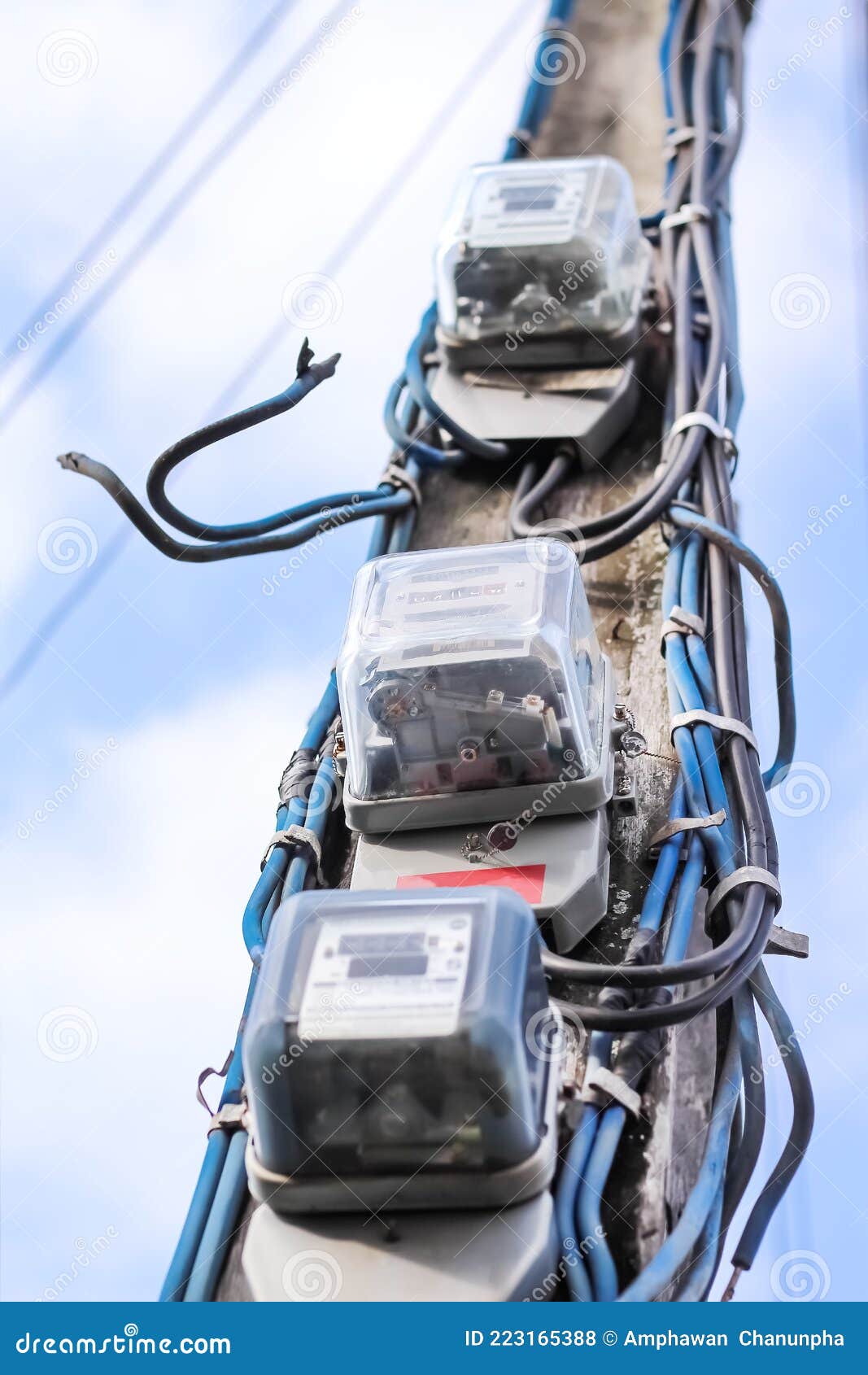 Electric Meters for Home on Pole on Blue Sky Background Stock Photo ...