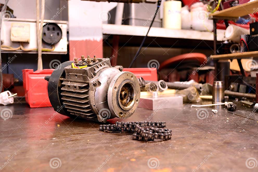 Electric motor and chain stock photo. Image of engine - 20025860