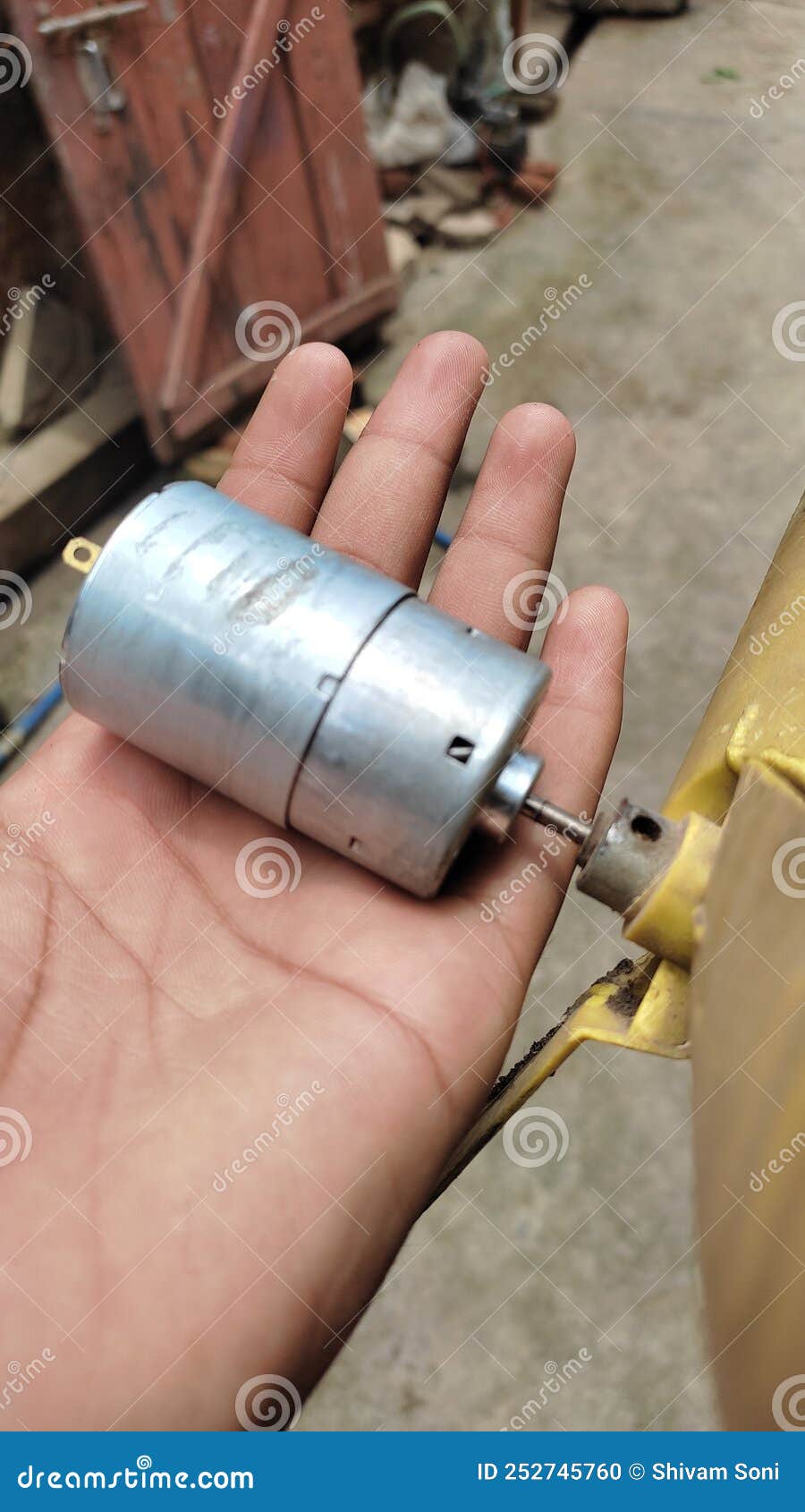 Electric motor stock photo. Image of firearm, hand, gadget - 252745760