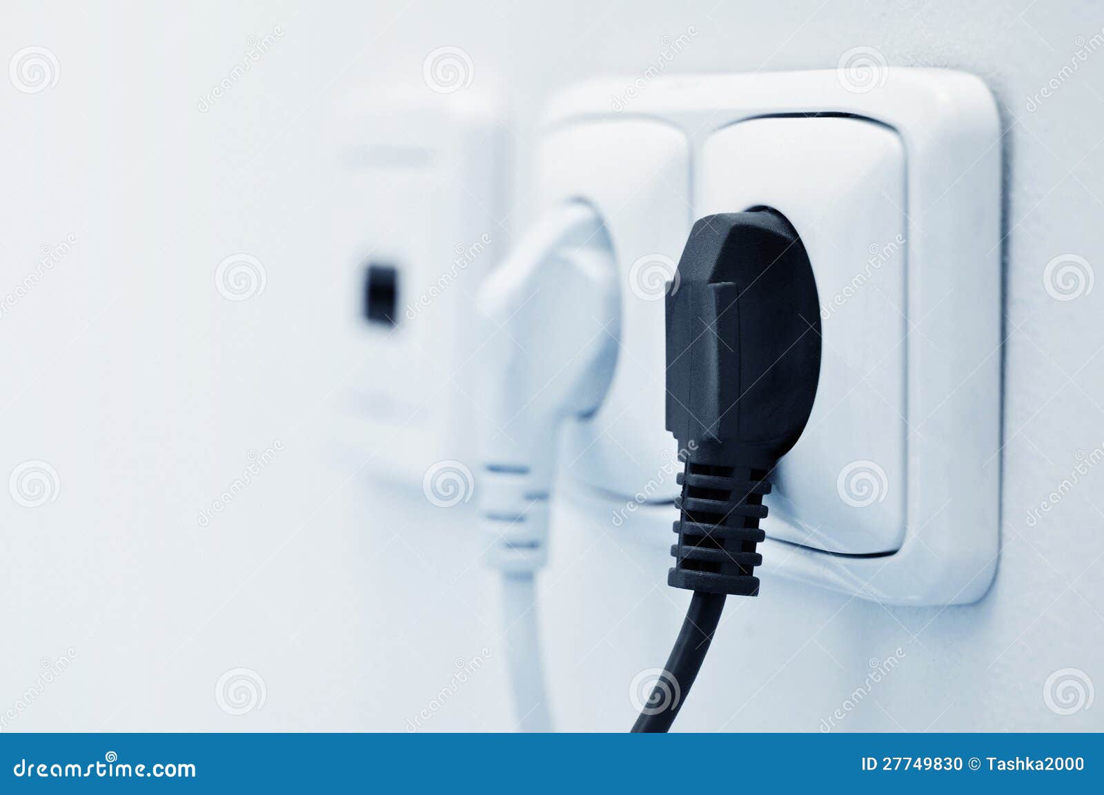 Electric plug in a socket stock photo. Image of flow - 27749830