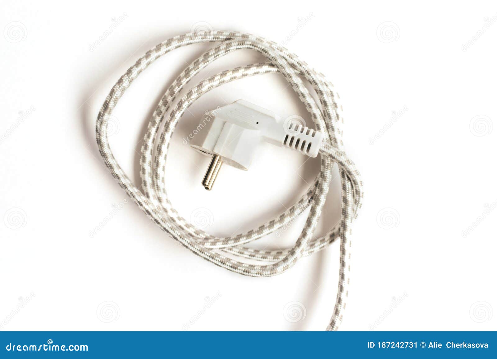 The Electric Plug is White. Braided Cord Rolled in a Circle Stock Image ...