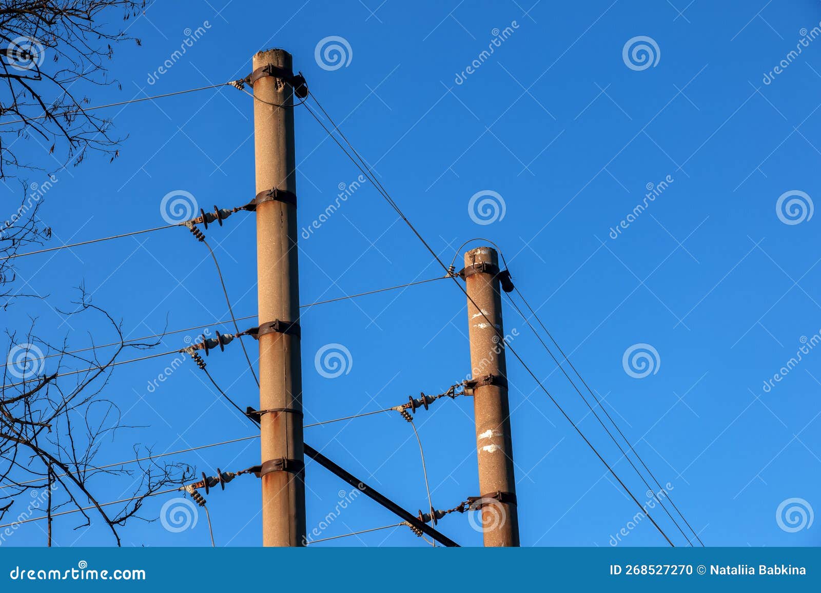 Electric Pole with a Linear Wire Against the Blue Sky Close-up. Power ...