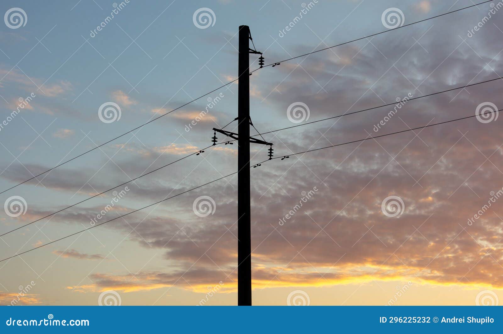 Electric Pole with Wires Against the Backdrop of the Sunset Stock Photo ...