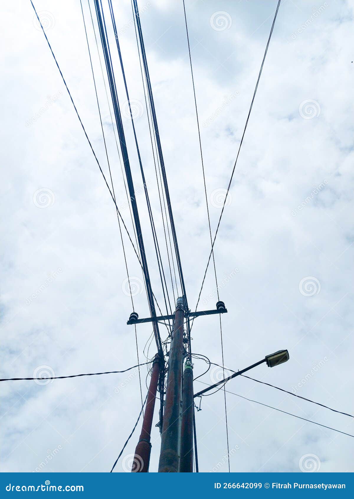 Electric Poles and Internet Cable Poles Huddled Close Together Stock ...