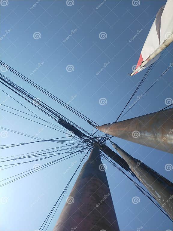 Electric Poles and Red and White Flags Stock Image - Image of poles ...