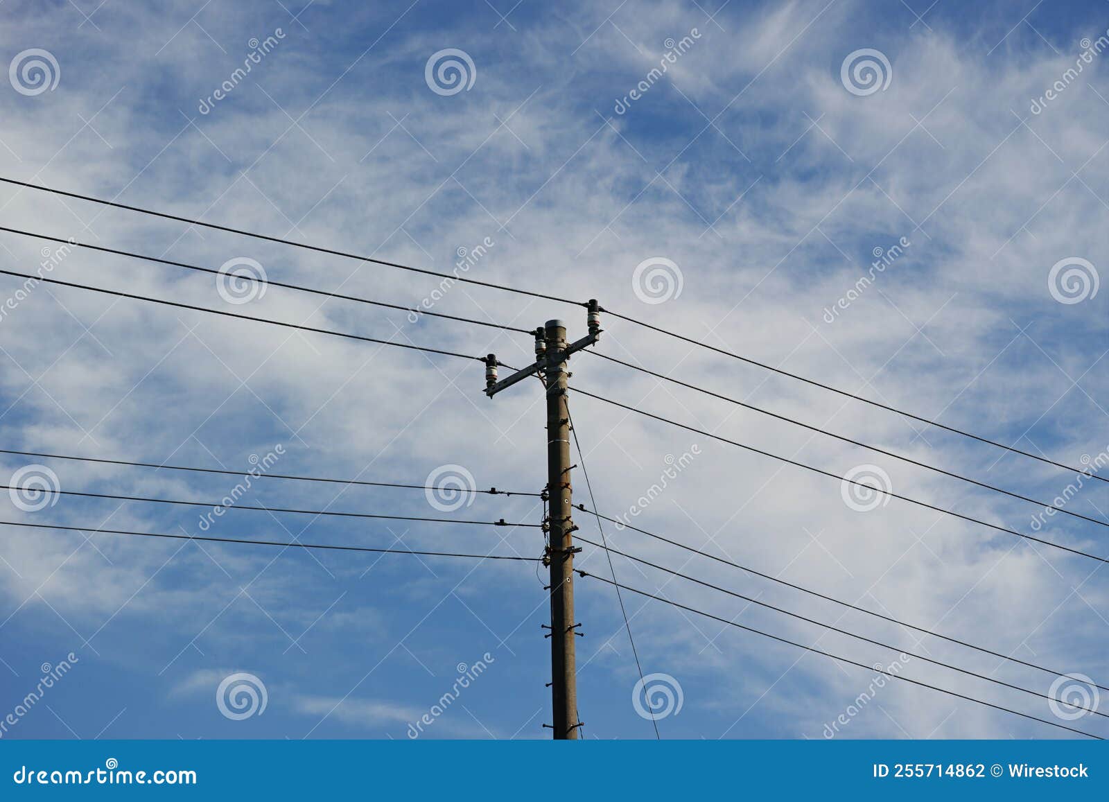Electric Post with a Cloudy Sky Background Stock Photo - Image of post ...