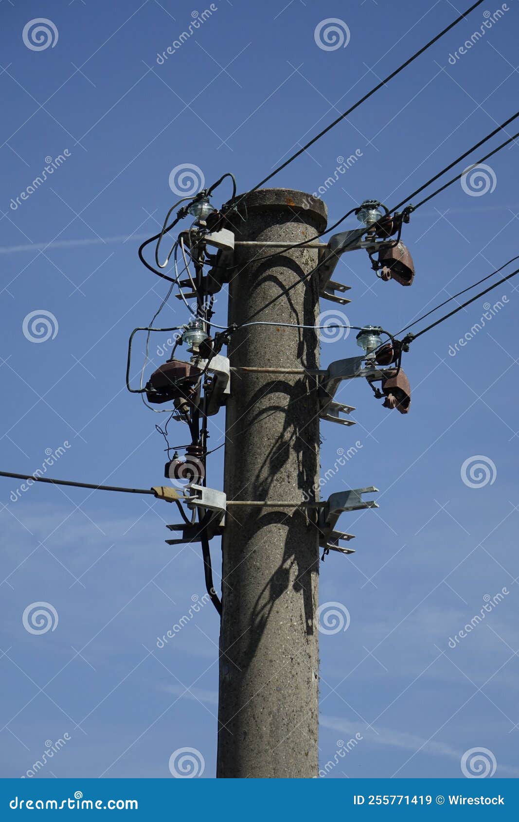 Electric Post with Wire and a Blue Sky Background Stock Image - Image ...