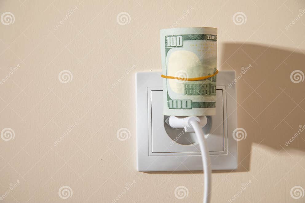 Electric Power Plug and Dollar with a Electric Socket Stock Photo ...
