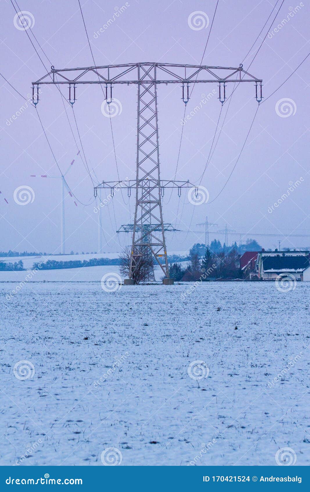 View of Electric Power Lines with Wind Turbines in Winter Landscape ...