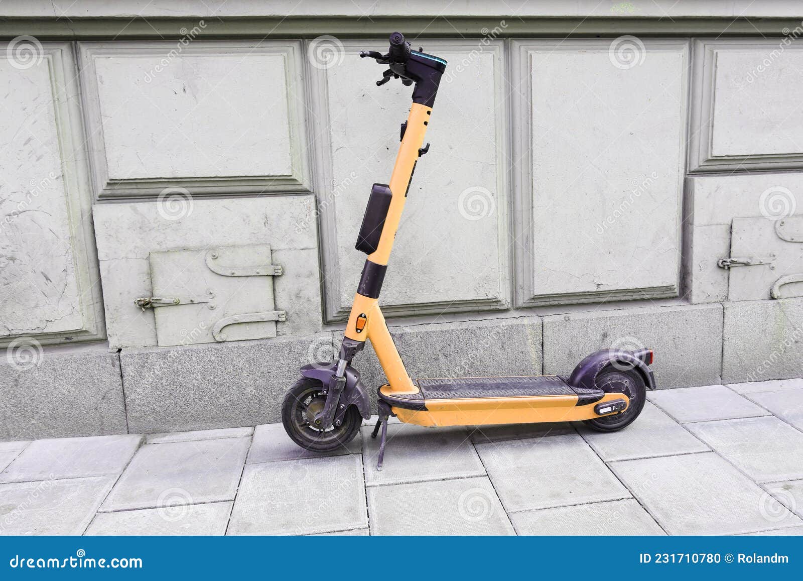 Electric Push Scooters Parked Near Building. Electric Scooters Stand In ...