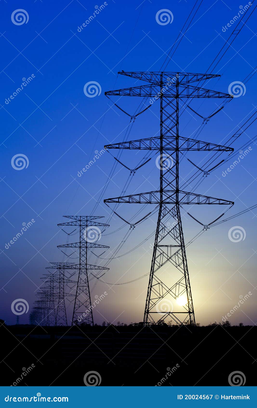 Electric Pylons Against Blue Sky with Sun Stock Image - Image of danger ...